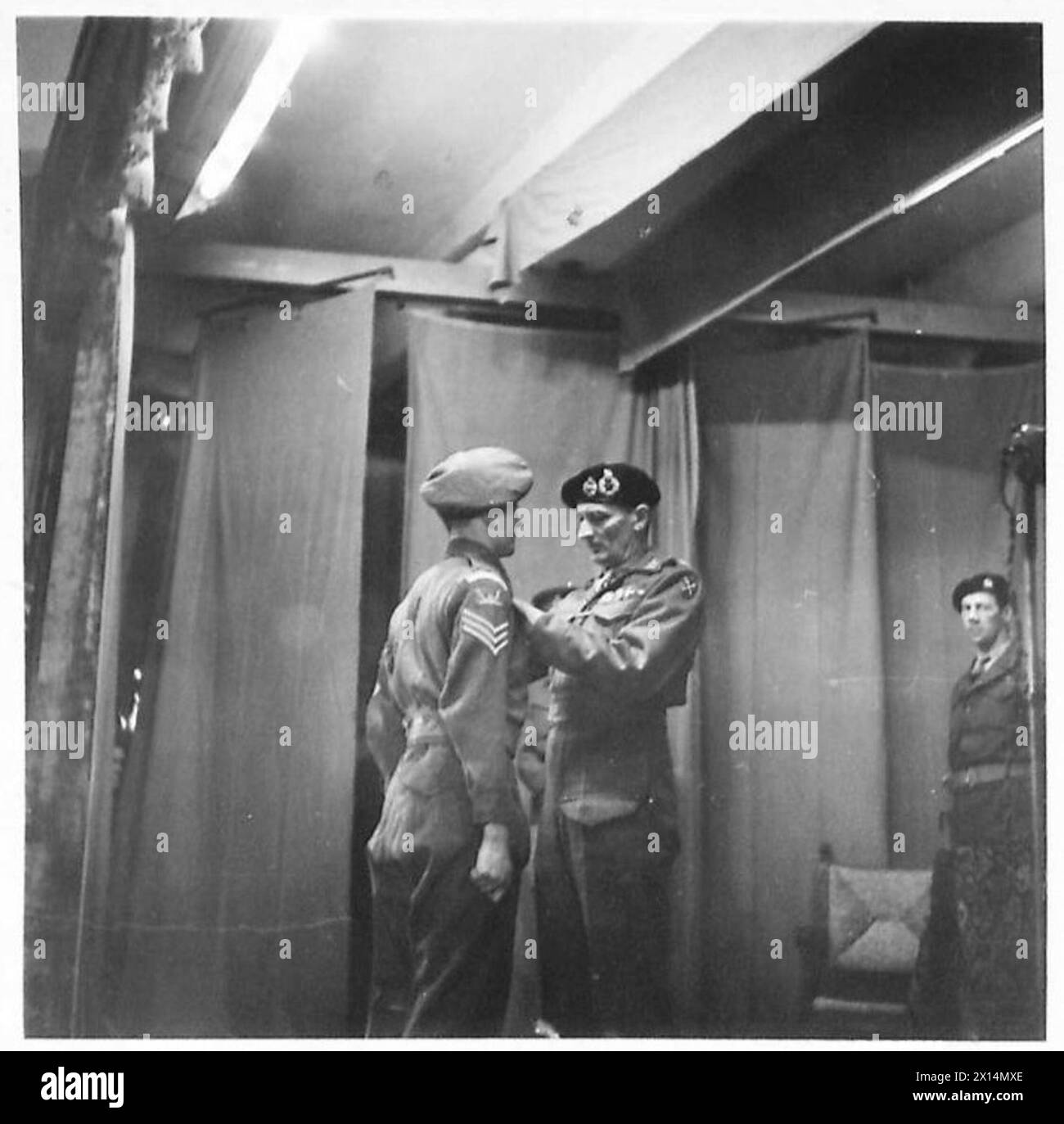 Sgt. J. Sullivan of the 1st Manchesters receives the Military Medal ...
