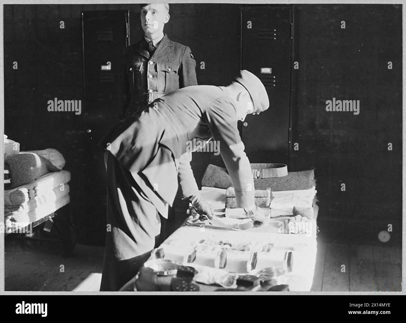RECRUITS FOR AIR CREW DUTIES IN R.A.F. - Inspection of kit. The cadet ...