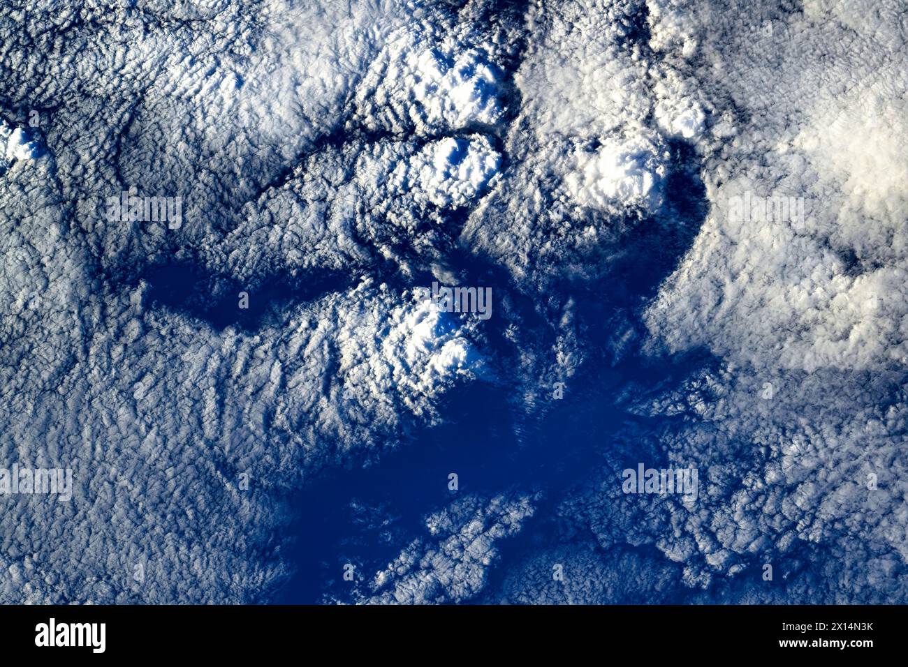 Cloudscape over the Pacific Ocean. Digital enhancement of an image by ...