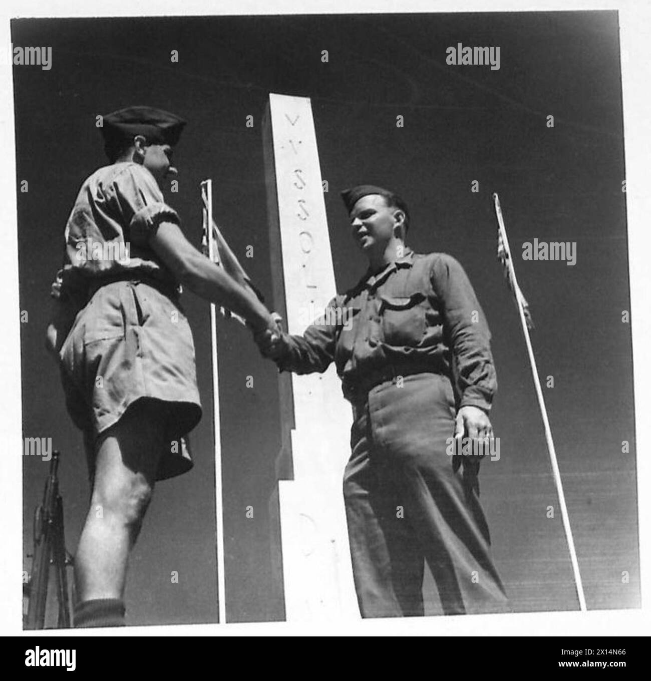 Allied personnel Dvr. Hoe and Adolph Meisler greet each other at the ...