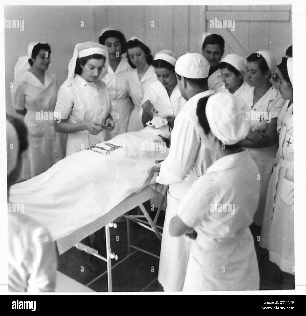 TRAINING OF VOLUNTEER NURSES IN CYPRUS - The class learns the use of surgical instruments, and ...