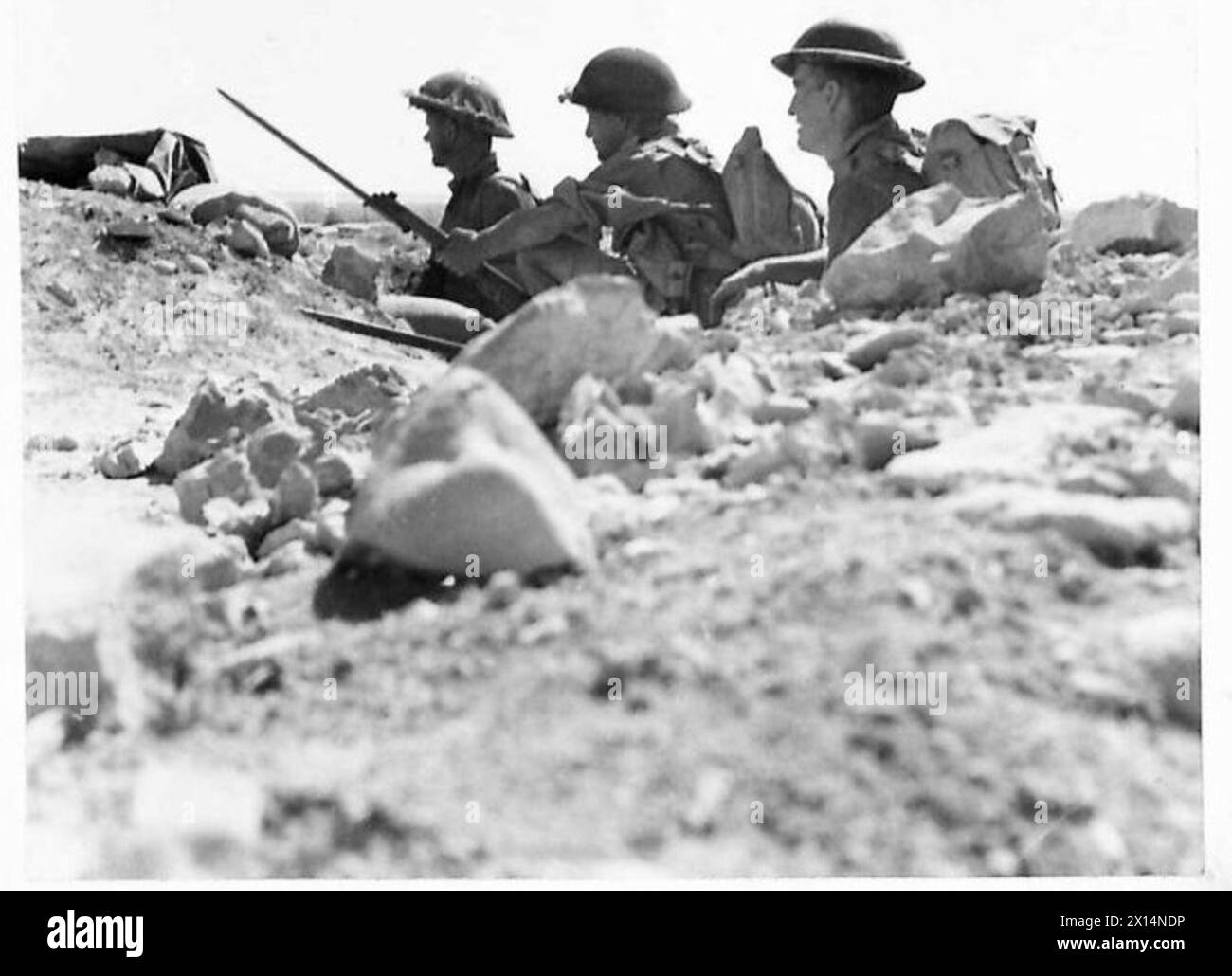 IN THE FRONT LINE - Front line troops keeping a good look out from ...