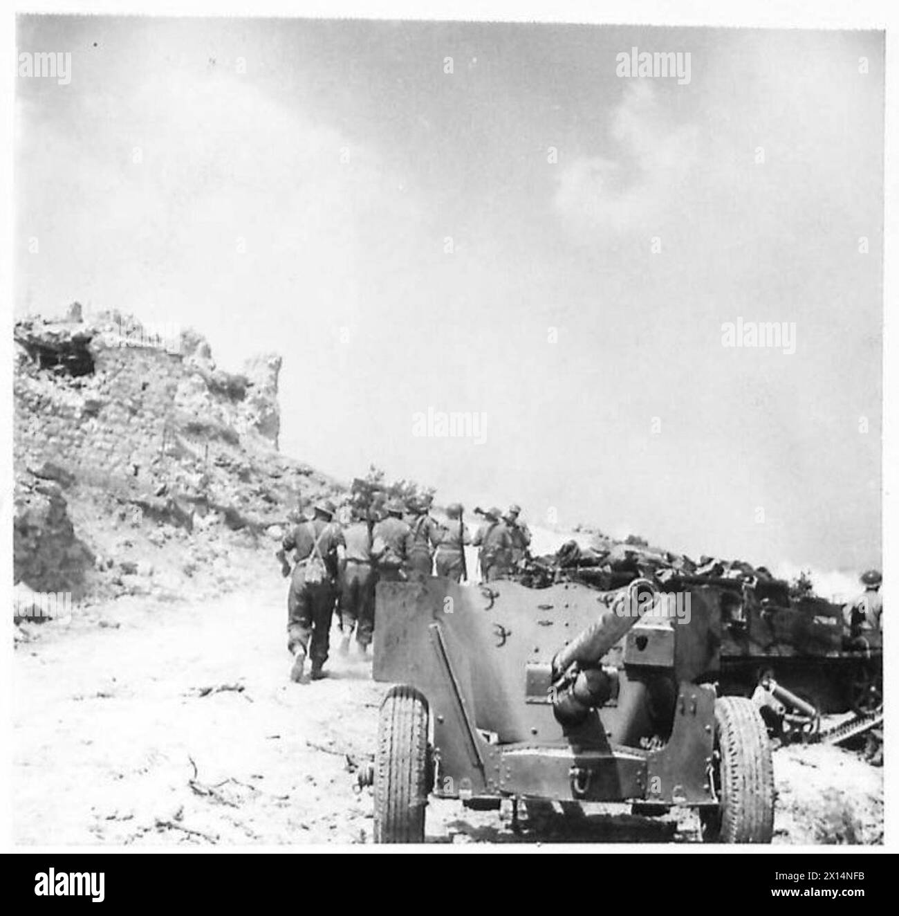 Infantrymen move through the ruins of San Angelo during the assault on ...