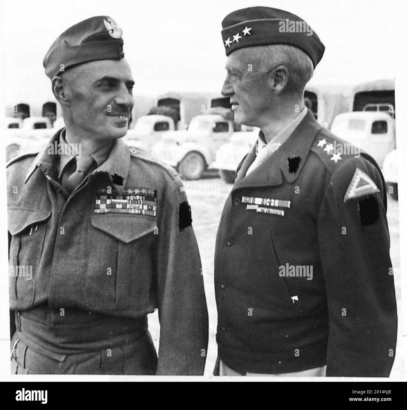 Generals George Patton and Władysław Anders exchange unit badges ...
