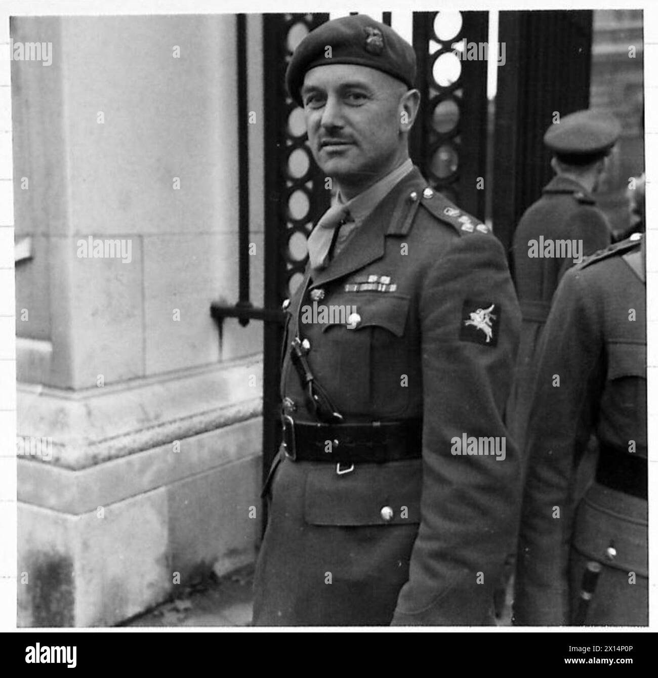 INVESTITURE AT BUCKINGHAM PALACE - Brigadier General E.W.C. Flavell ...