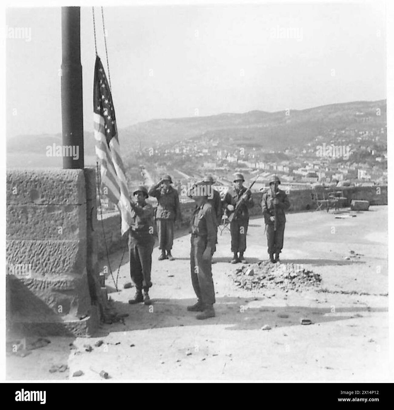 American troops of the 91st Division hoist the Stars & Stripes over San ...