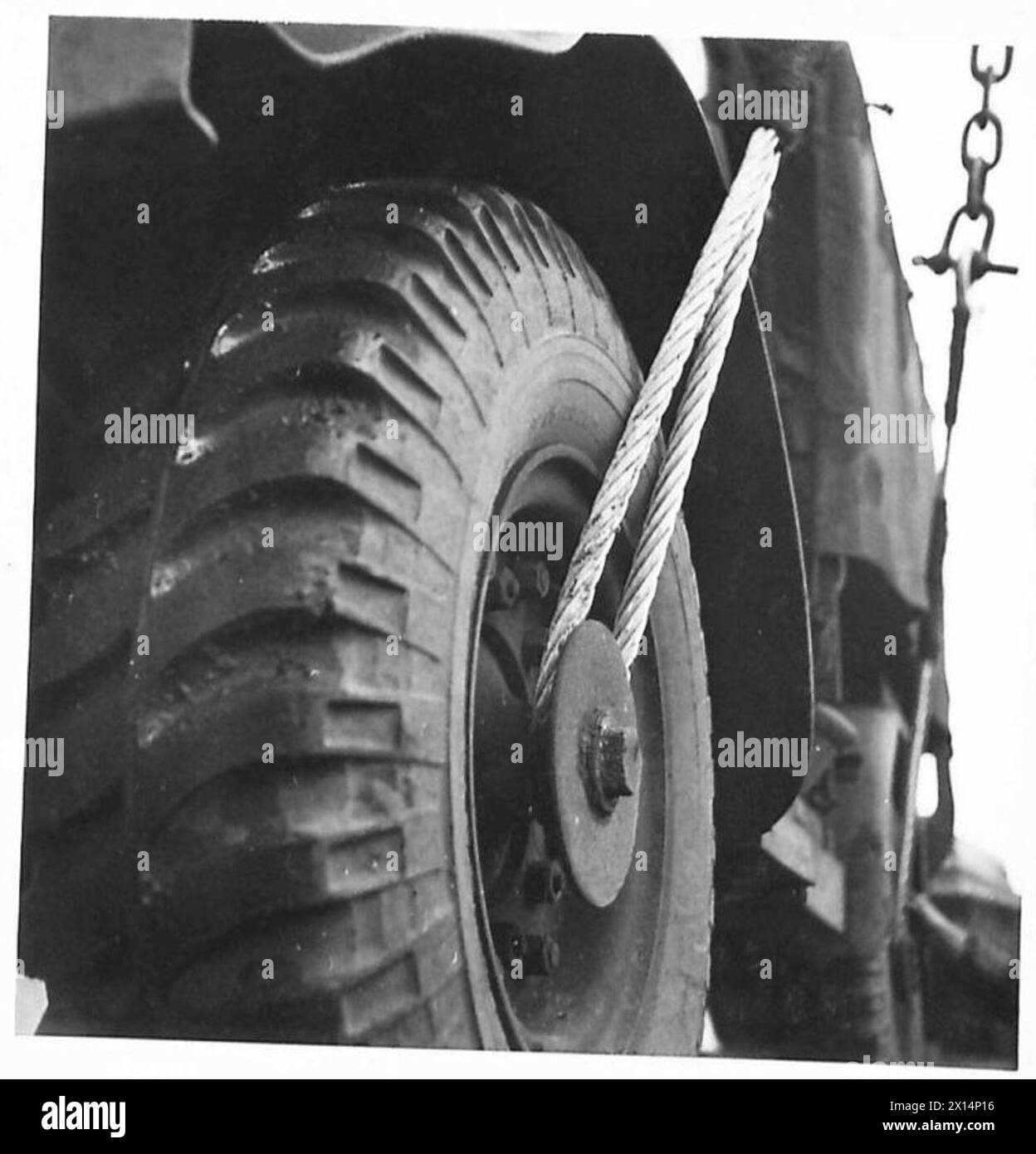 PHOTOGRAPHS OF VEHICLE LOADING TACKLE IN USE - Close-up of front sling ...