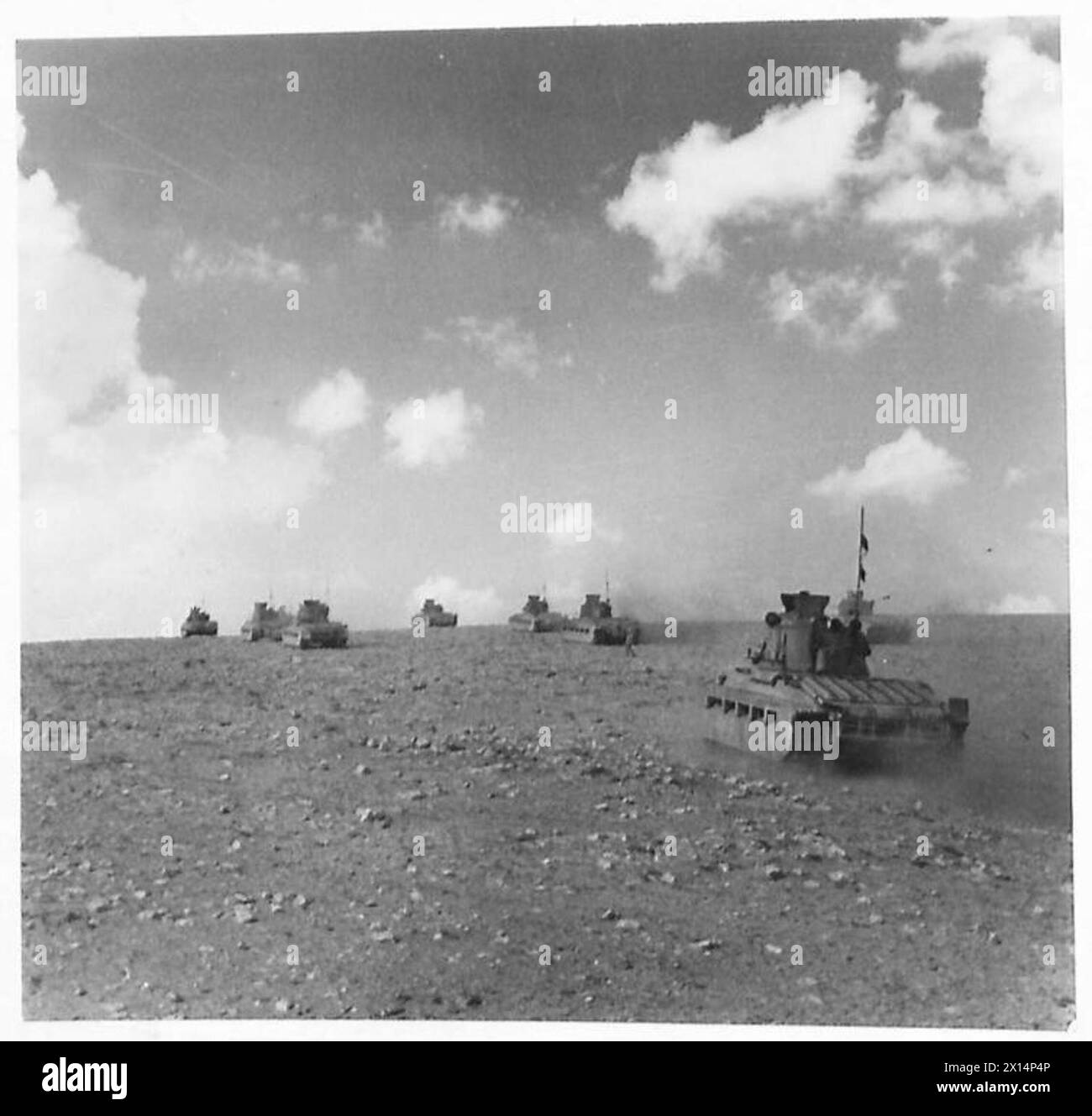 WITH THE TANKS AT TOBRUK - They break up their line formation and go ...