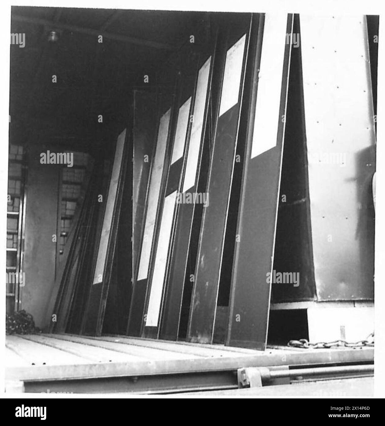 Packages and a lorry are shown as part of the tank sealing process at ...