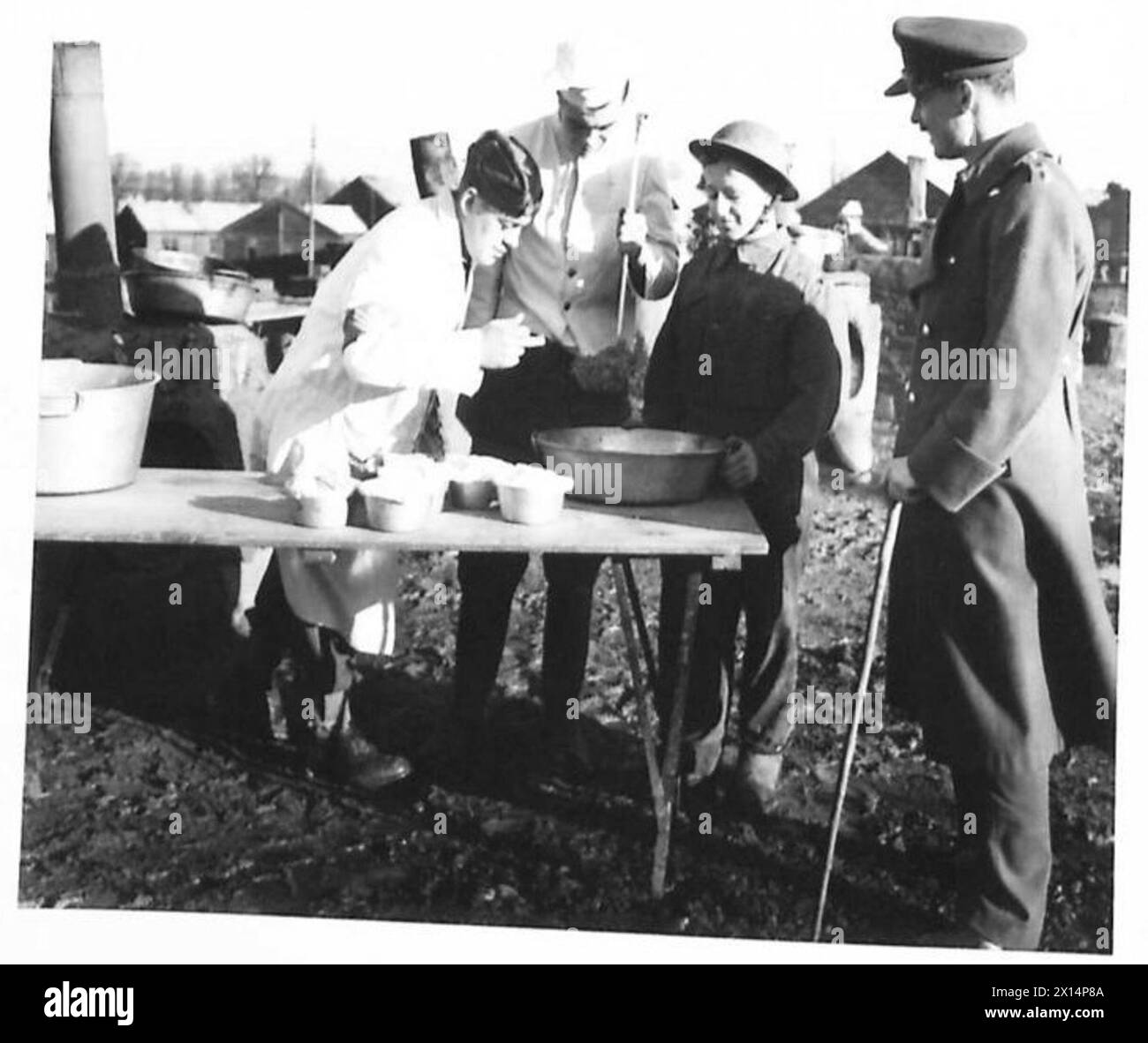 CHRISTMAS TIME IS PUDDING TIME - A Sergeant Cook gives his approval ...