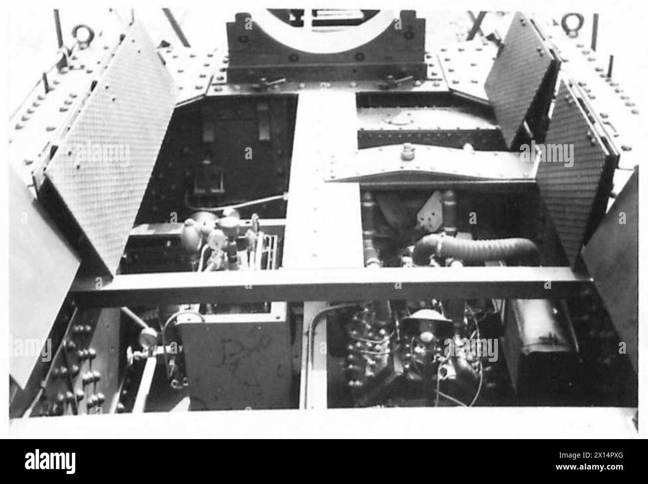 The engine room and structural details of a very large railing-mounted ...