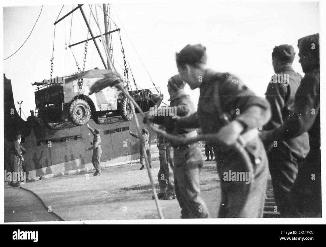 BRITISH AND CANADIAN TROOPS IN ICELAND - Artillerymen loading gear at ...