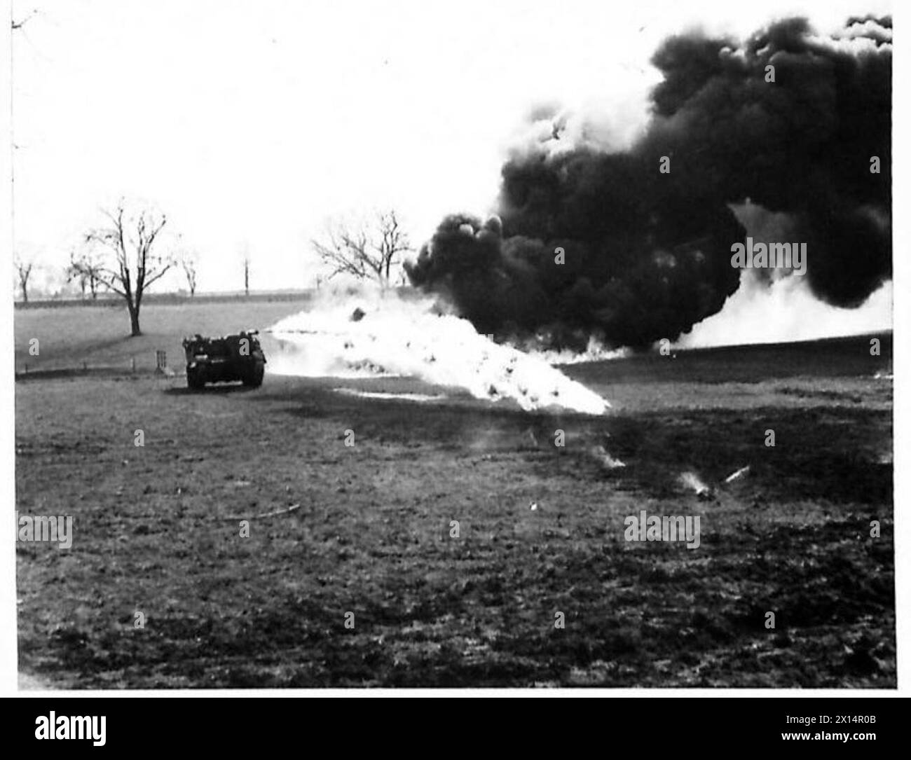 FLAME WEAPONS DEMONSTRATION - Bren gun carrier operating a flame ...