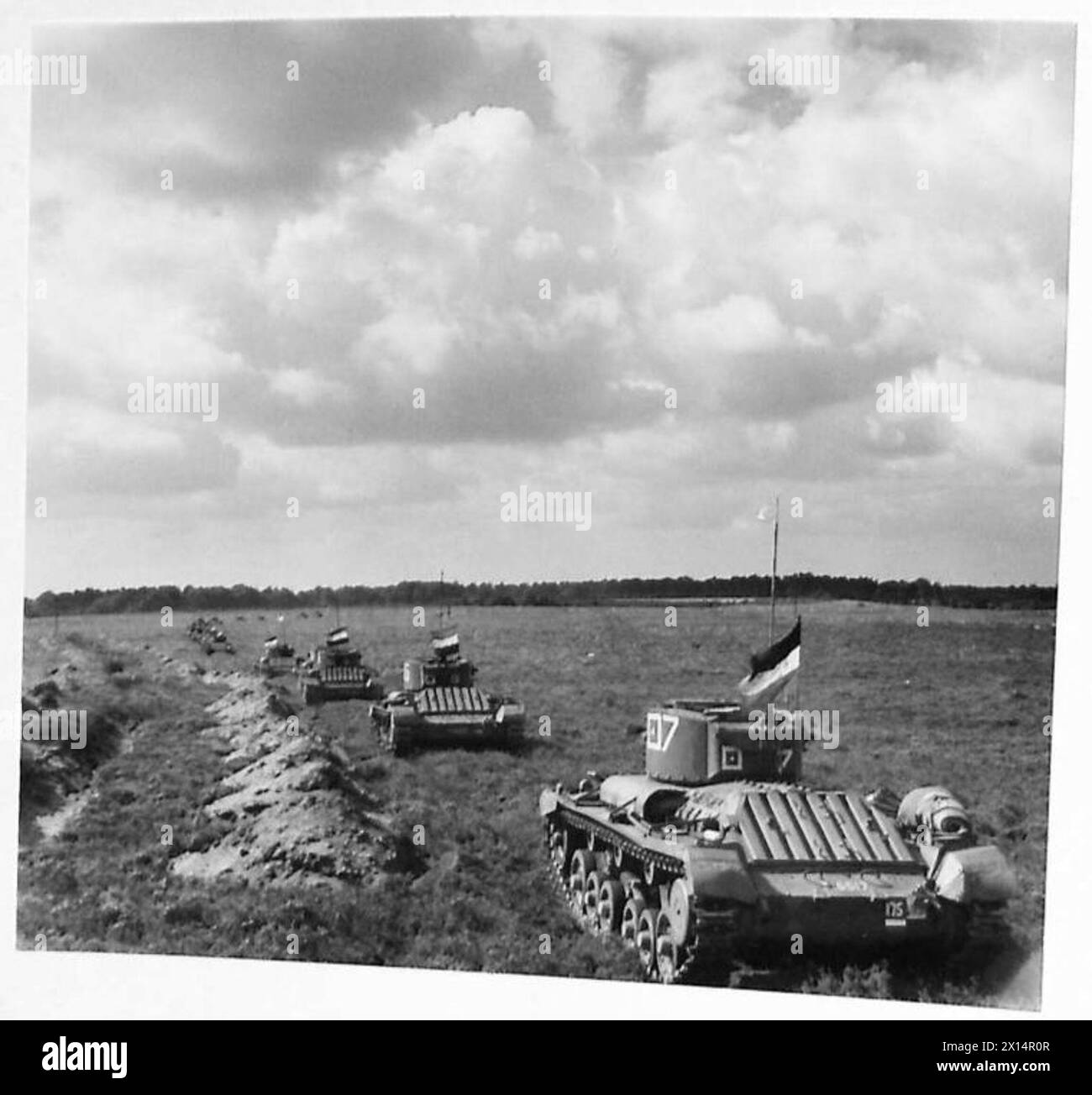 AND STILL THEY COME - The exercise over, the tanks hoist their colours ...