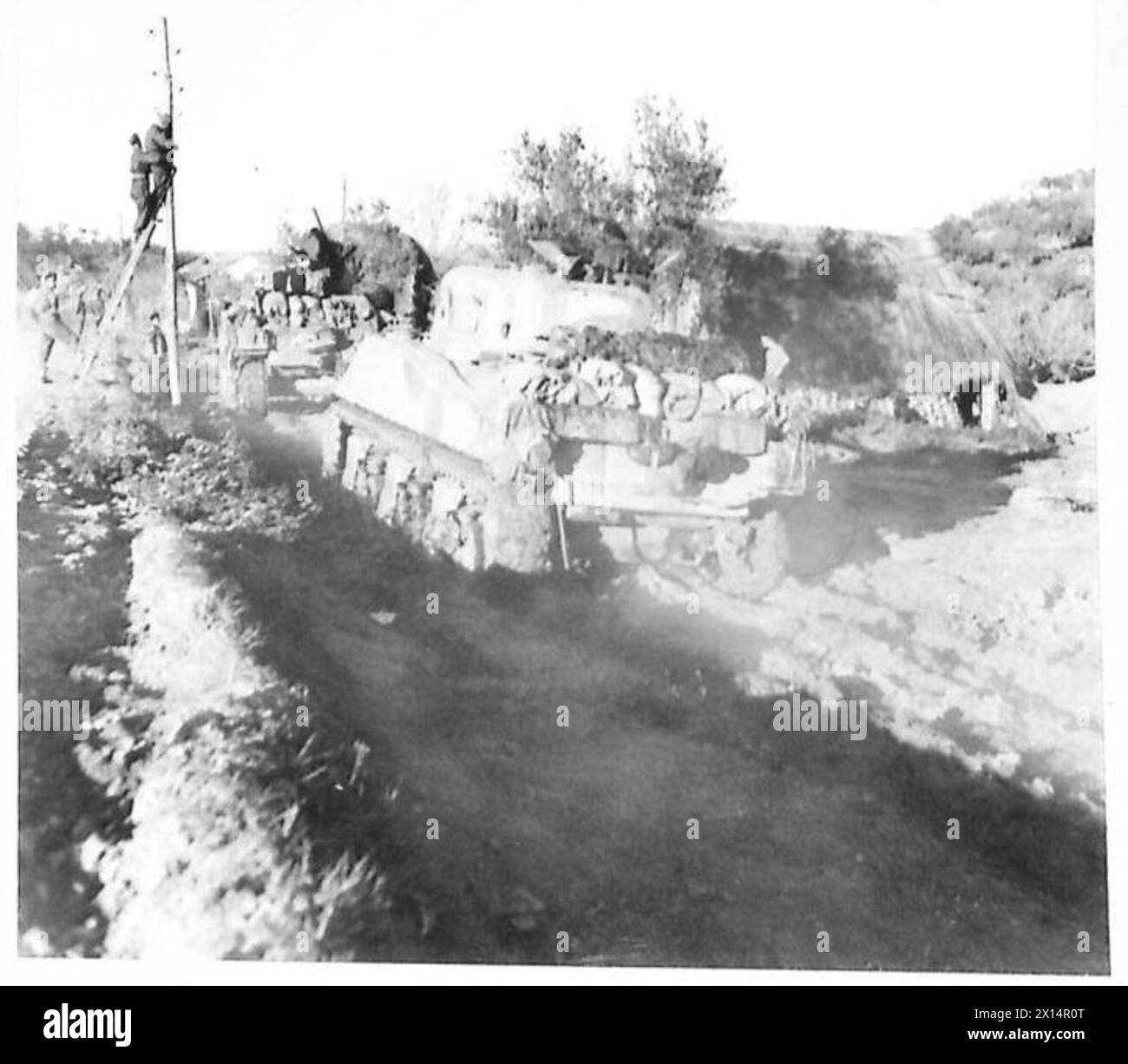 Sherman tanks advance toward the Sangro River while Royal Signals ...