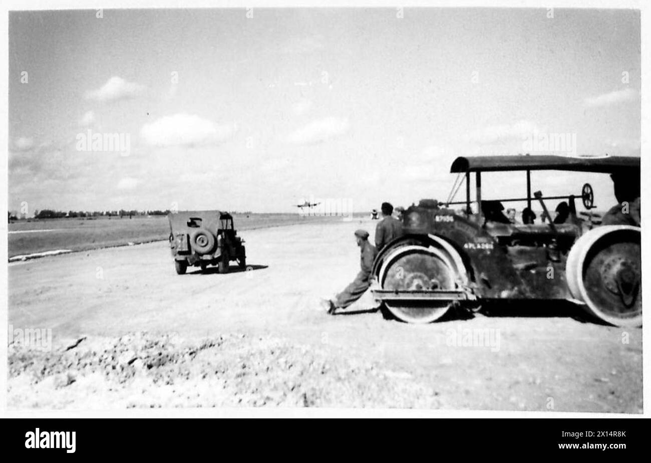 AIRFIELD RECONSTRUCTION [FRANCE] - While work is still in progress on ...