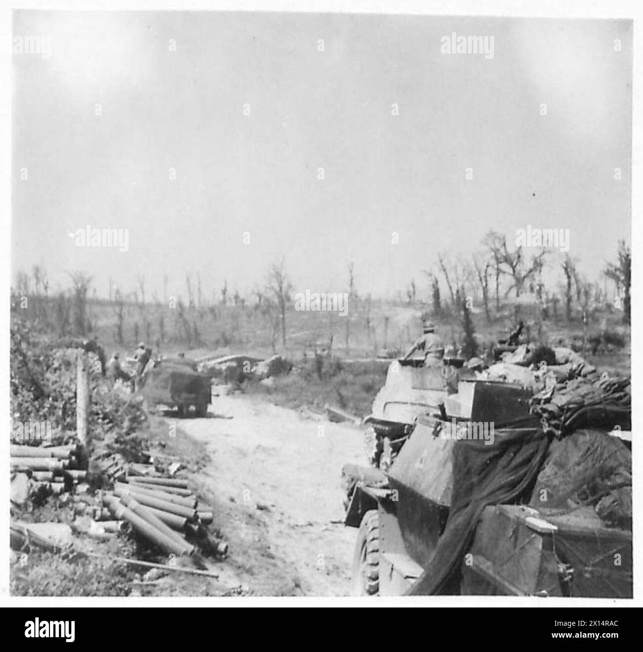 Armoured vehicles advance along the San Angelo road during the assault ...