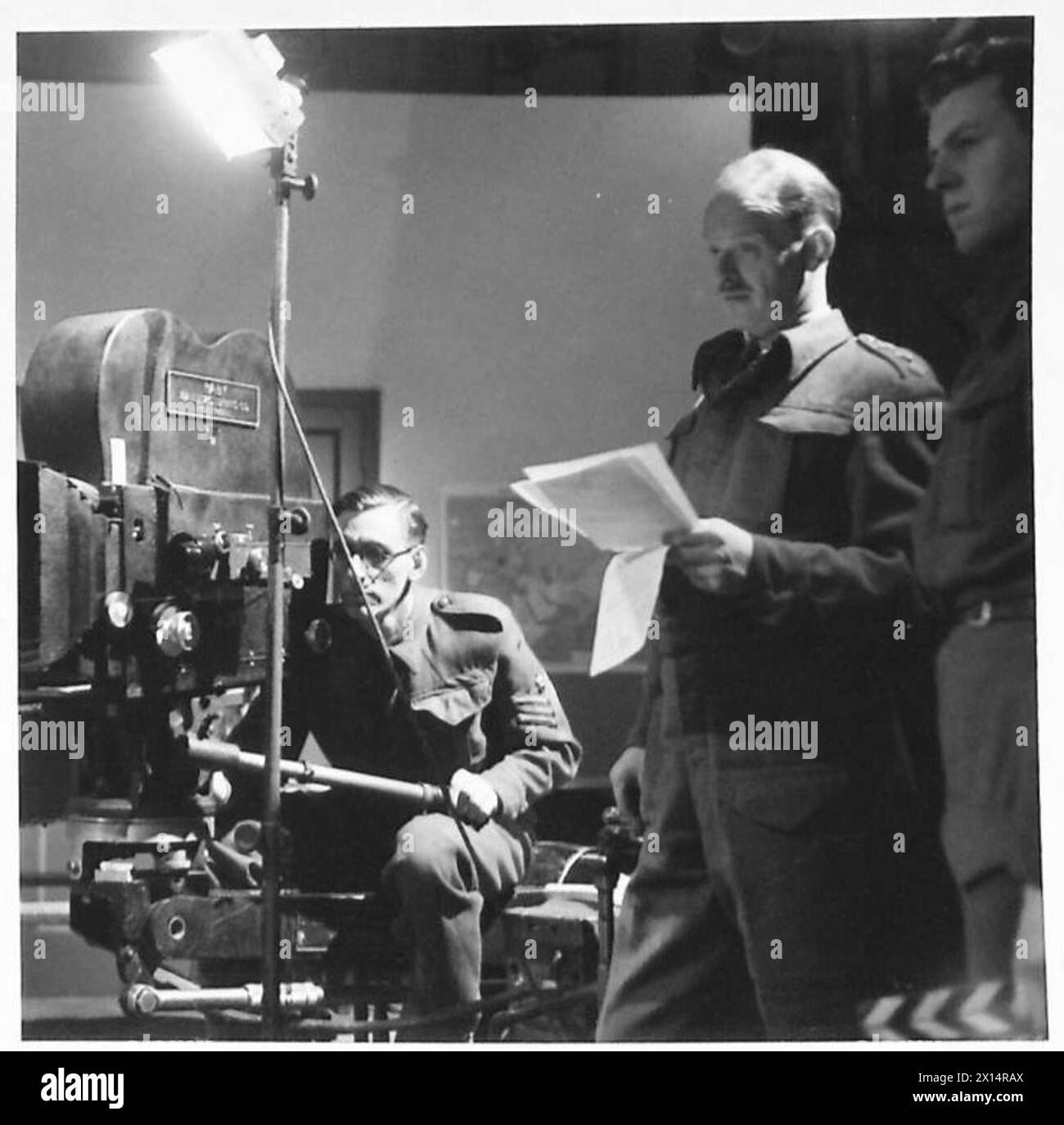 THE ARMY FILM UNIT AT PINEWOOD - The director, with script in hand ...