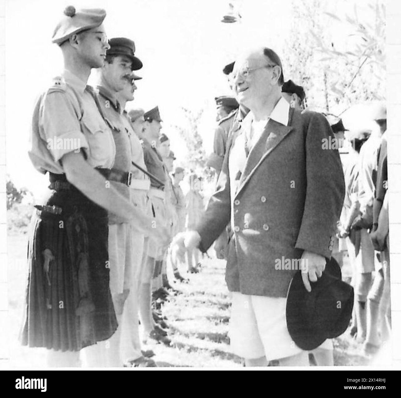 SECRETARY OF STATE FOR INDIA VISITS FIFTH ARMY - Mr. Amery shakes hands ...