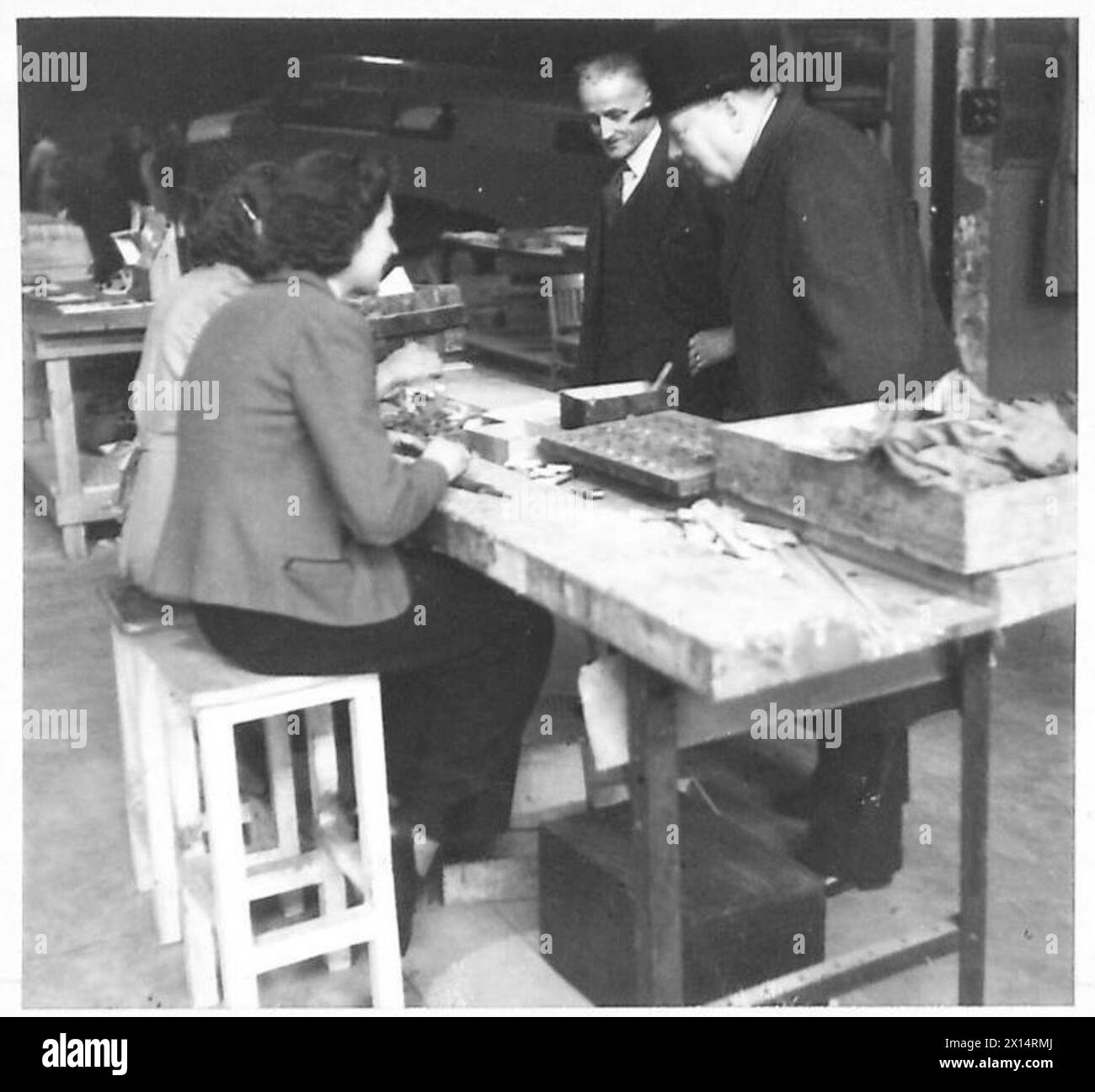 Prime Minister Winston Churchill visits an aircraft factory and speaks ...