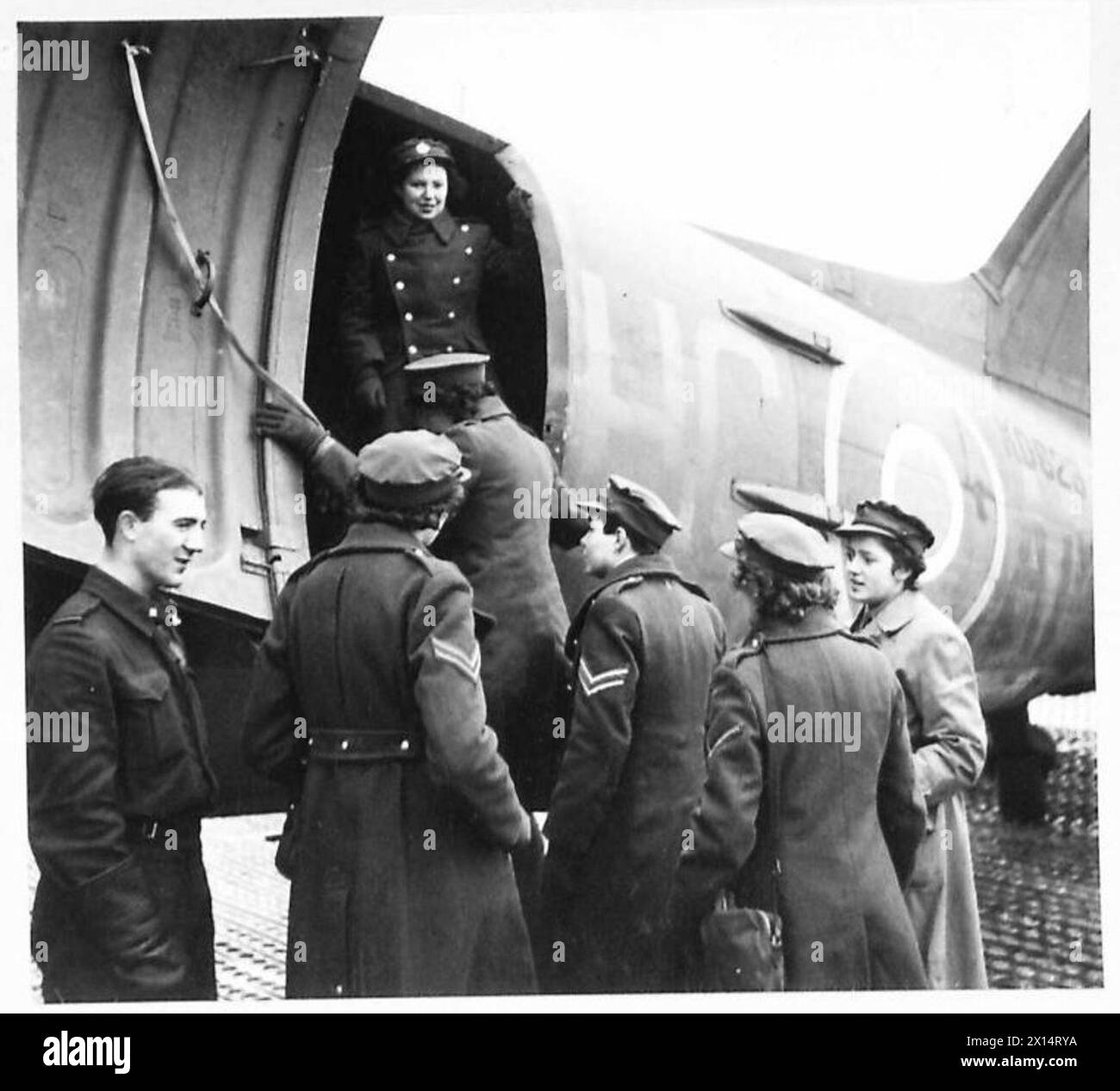 A.T.S. WITH B.L.A. GO ON LEAVE TO ENGLAND - The A.T.S. board the plane ...