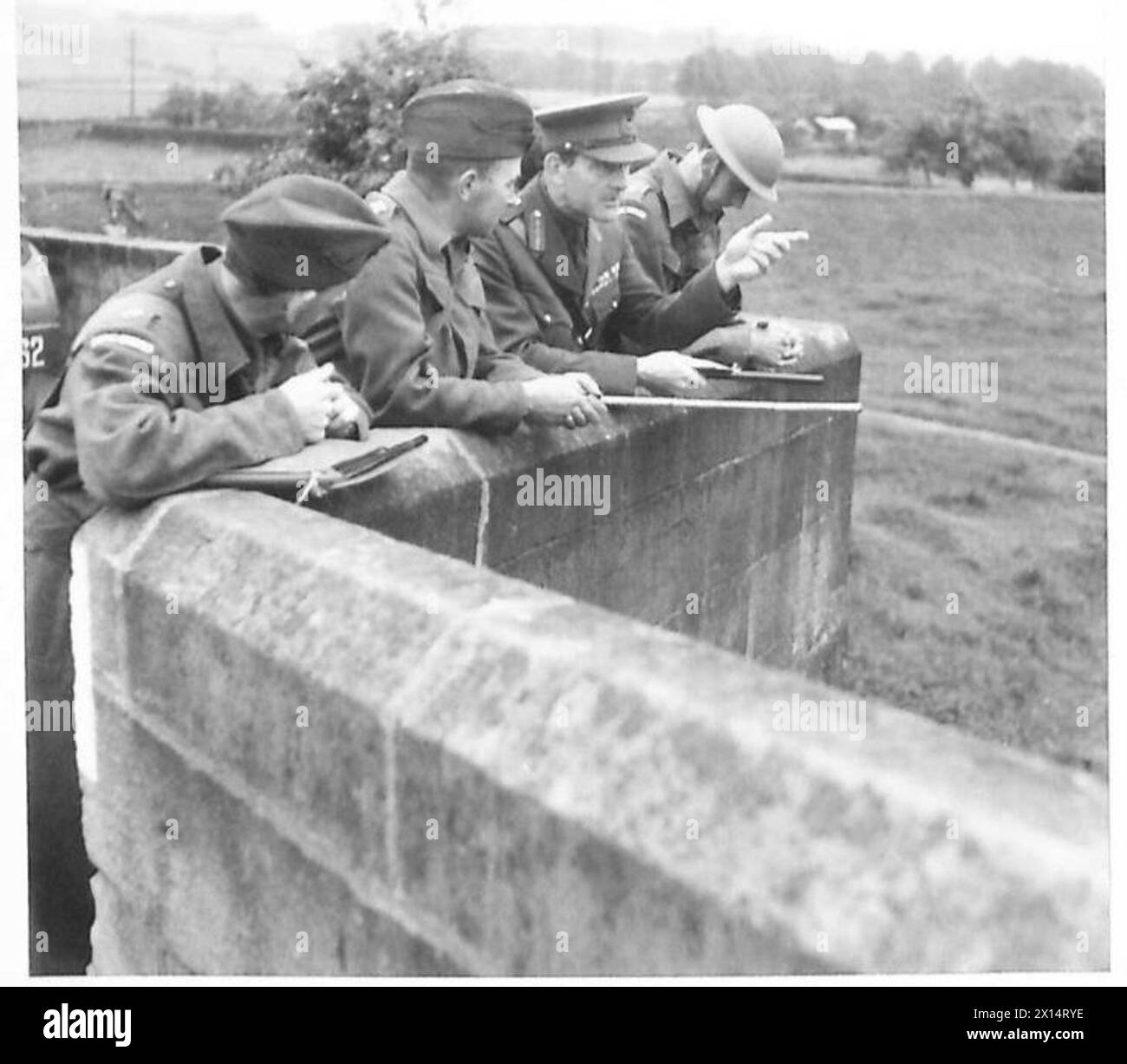 Lieutenant-General T.H. Eastwood, GOC-in-C, discusses the exercise ...