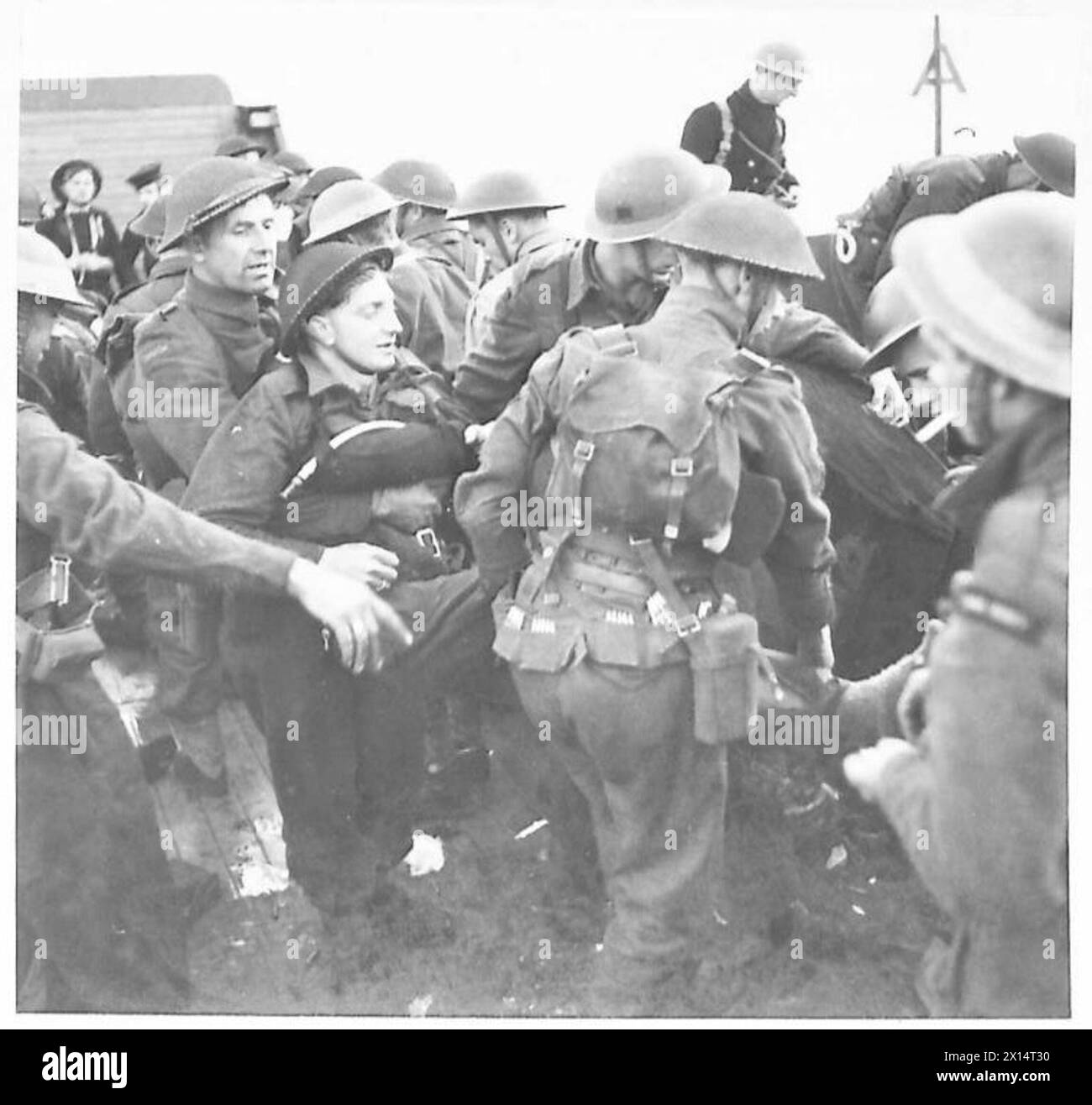 THE RAID ON DIEPPE - Wounded being dealt with aboard landing craft ...