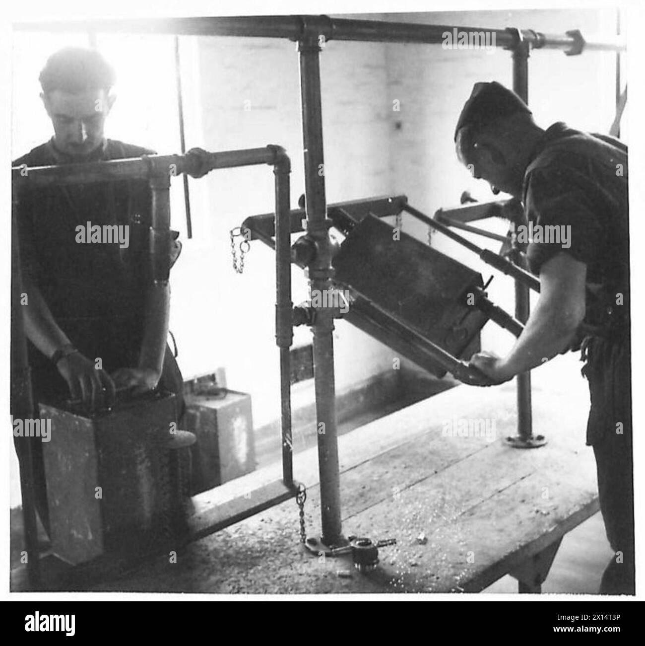 BASE PETROL FILLING DEPOT - Testing the tins for leaks with high ...