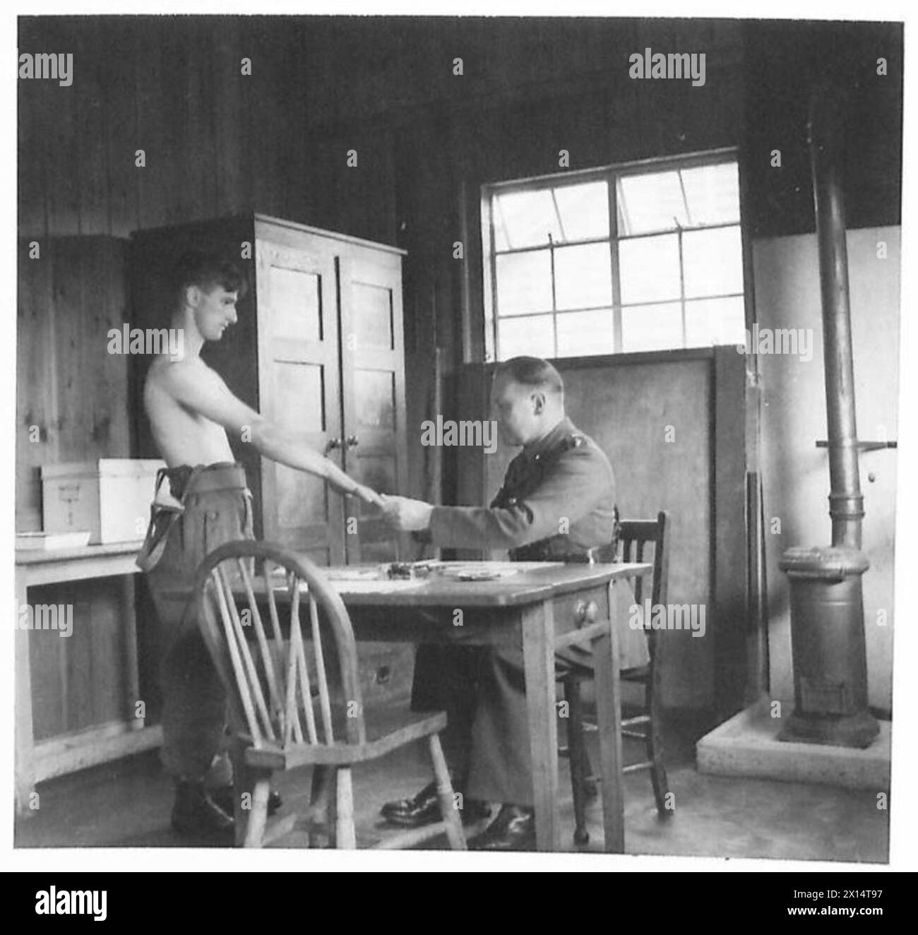 CONNAUGHT HOSPITAL, ALDERSHOT - Scabies treatment. Patient being ...