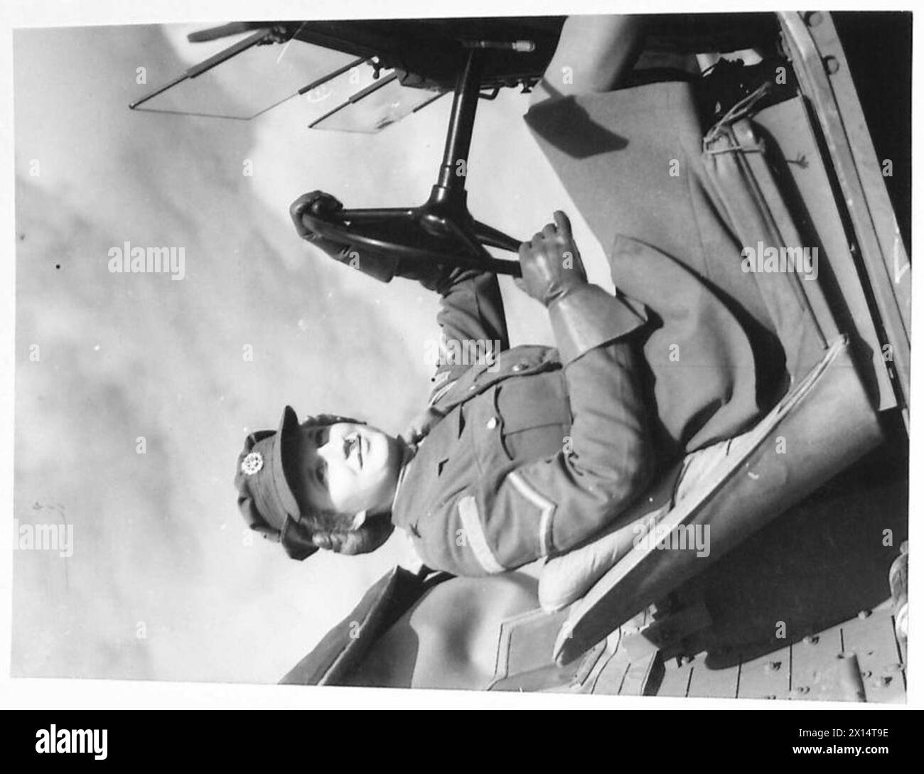 An ATS driver is depicted in close-up while participating in a British ...