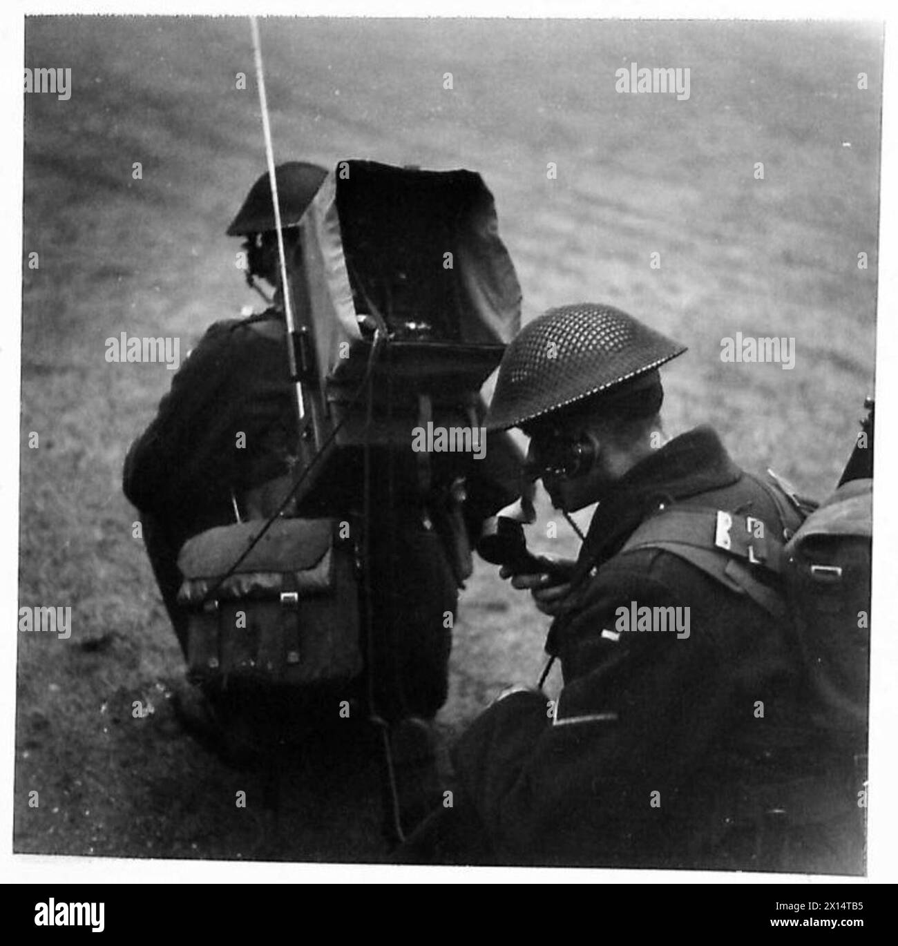 Signalmen operate portable wireless sets during British Army exercises ...