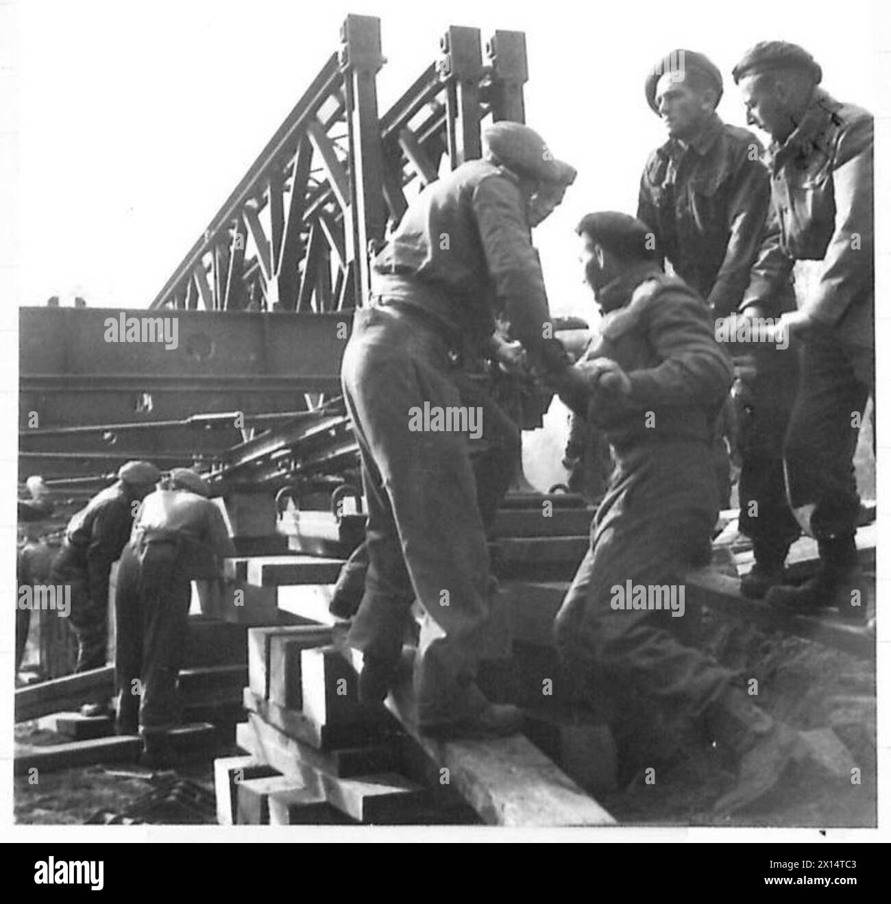 BRIDGING: 49 DIV. 1ST. CORPS B.L.A. - Jacking up bridge and removing ...