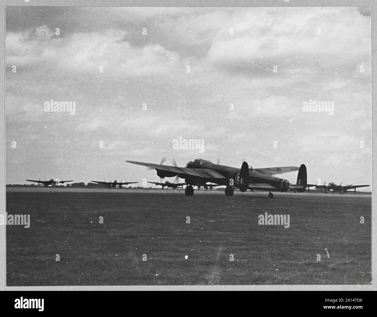A fully-loaded Lancaster bomber is shown preparing for takeoff during ...