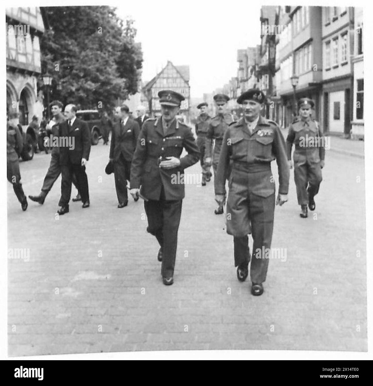 The Commander-in-Chief walks to the saluting base with Major General ...