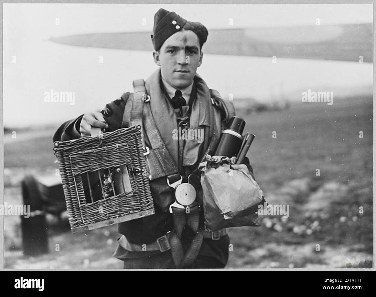 The wireless operator boards a Hudson aircraft carrying rations, log ...