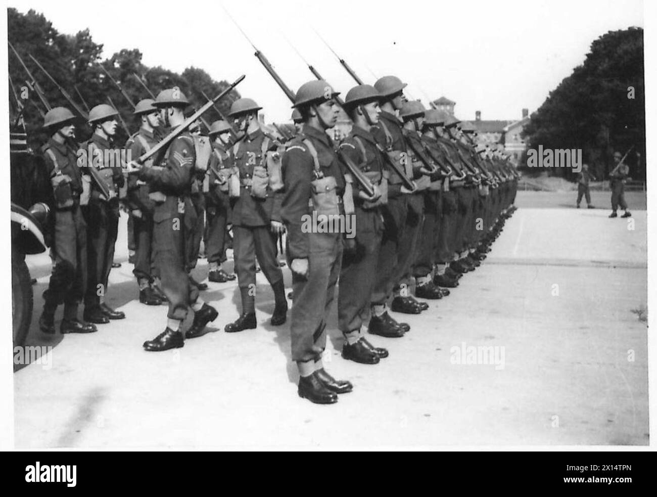 At Victoria Barracks, Windsor, Grenadier Guards recruits are inspected ...
