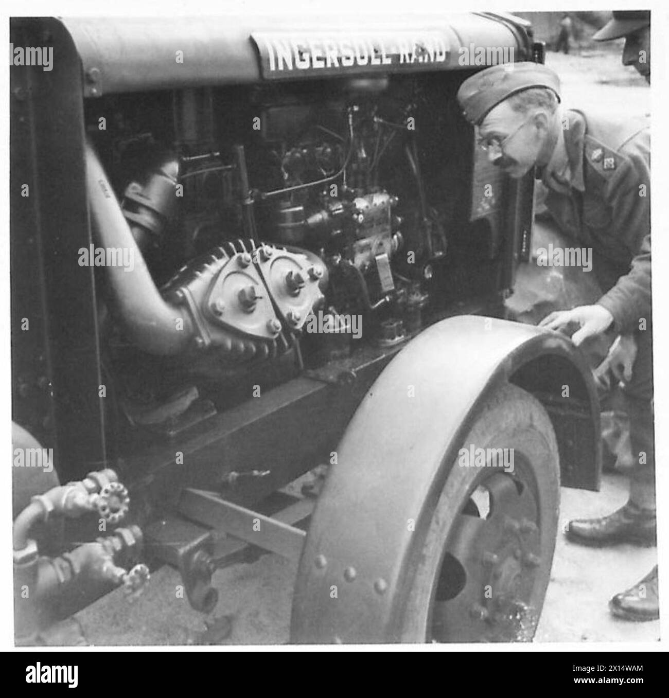 Lt. Col. Heywood Waddington, CRE of the Royal Engineers, inspects ...