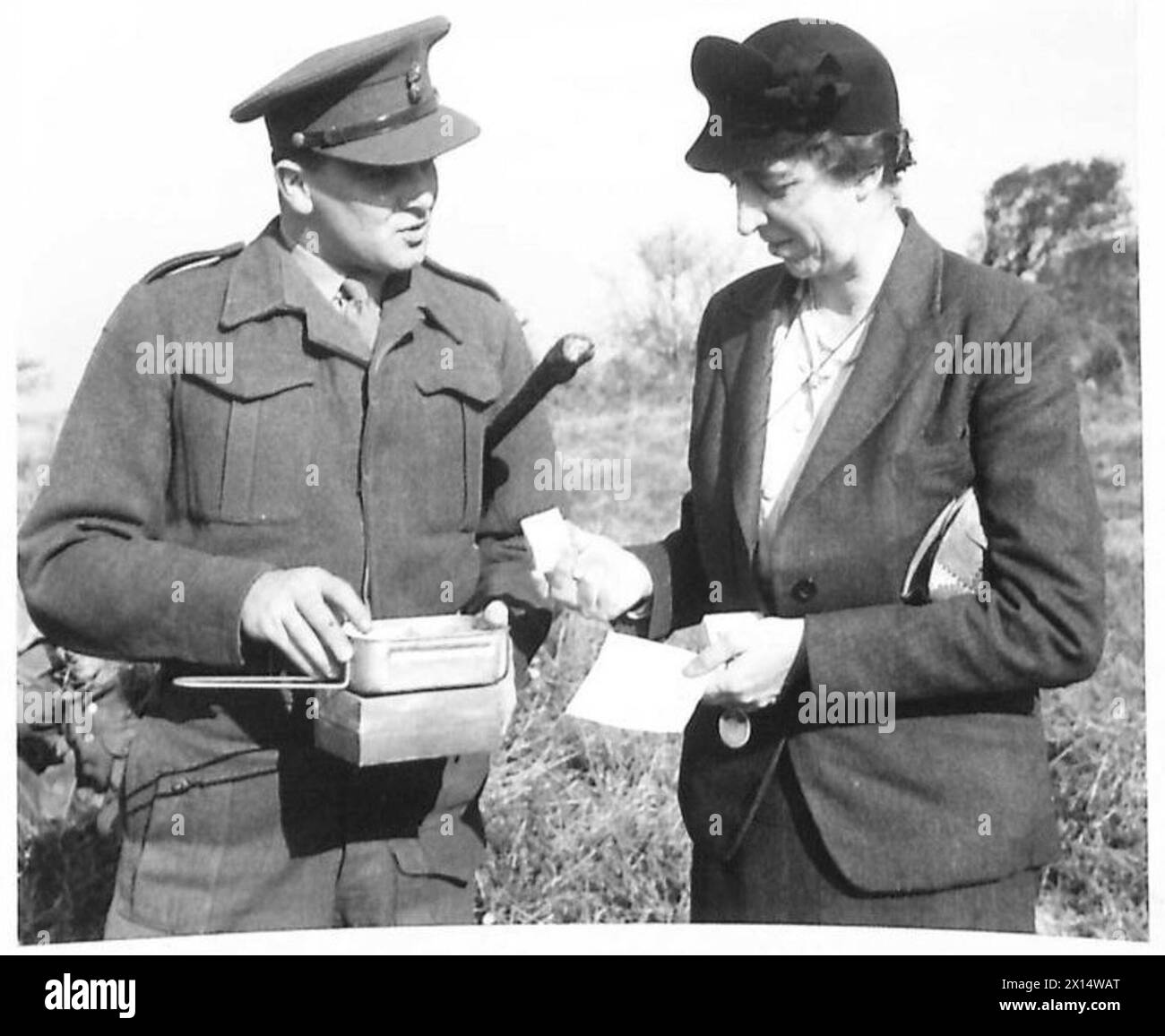 THE HON. MABEL STRICKLAND WATCHES BATTLE SCHOOL TRAINING - An officer ...