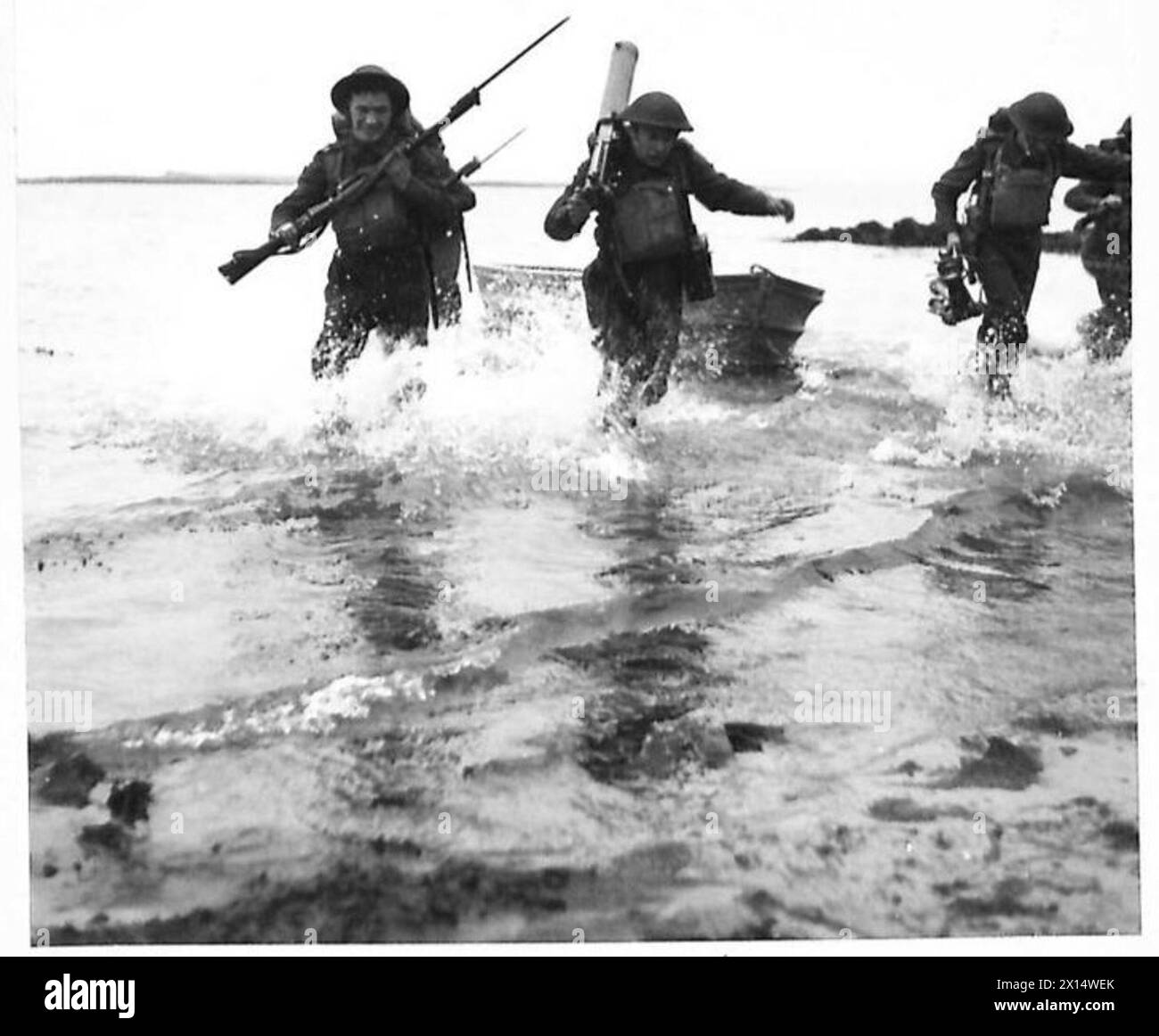 Troops are shown arriving for beach landing practice, moving to action ...