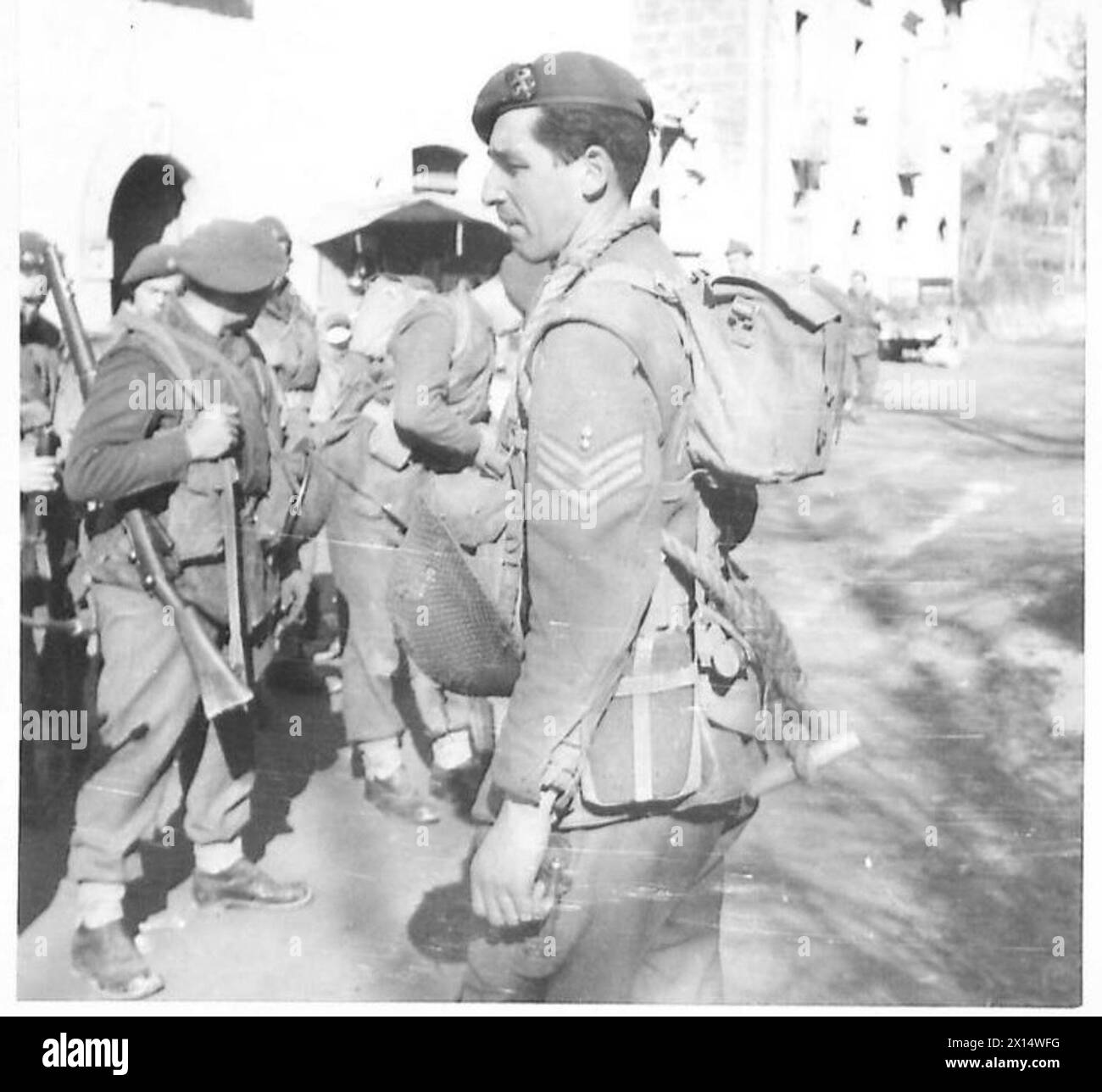 A sergeant of the Belgium Commandos carries a climbing rope during ...