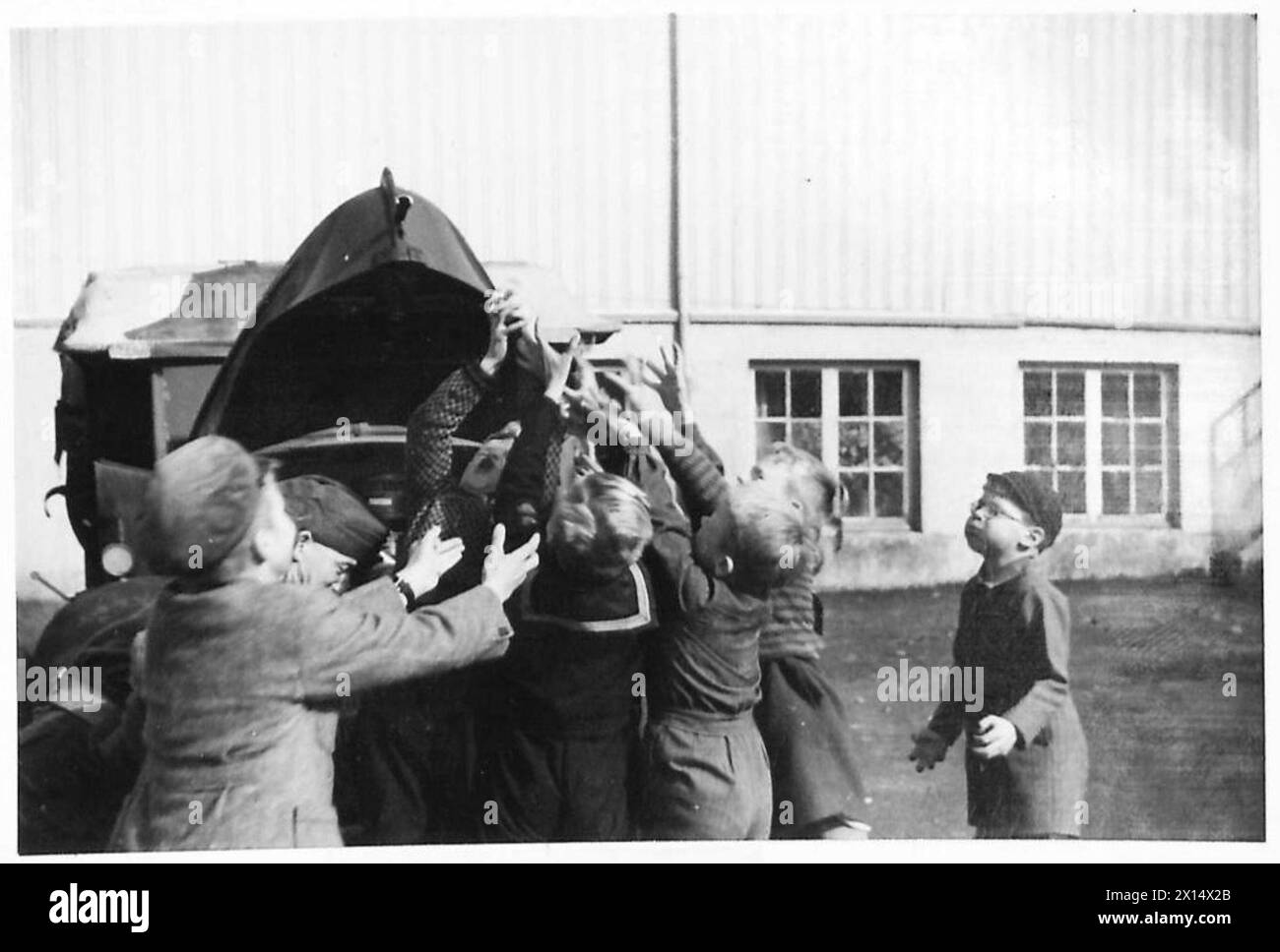 BRITISH AND CANADIAN TROOPS IN ICELAND - Children playing and ...