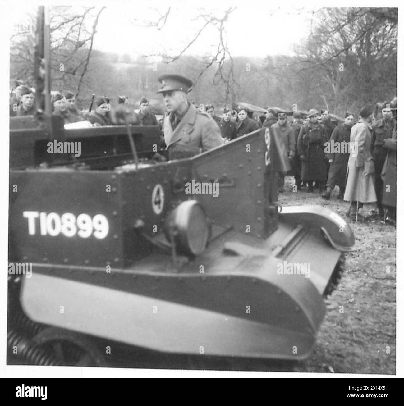 A Brigadier inspects a Bren gun carrier while on duty with the British ...
