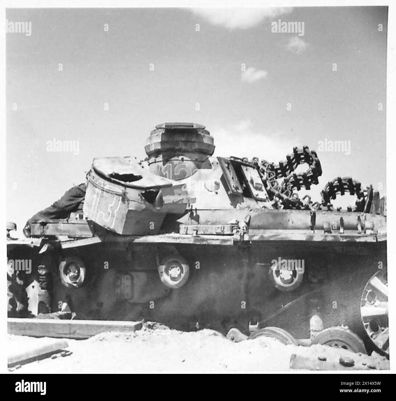 A German Mark II tank is shown damaged with its turret dislodged by ...
