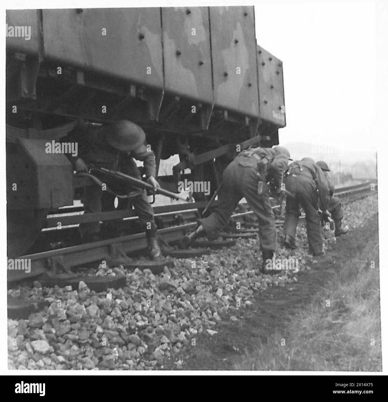 HOME GUARD'S ARMOURED TRAIN - Dismount action. Home Guards passing ...