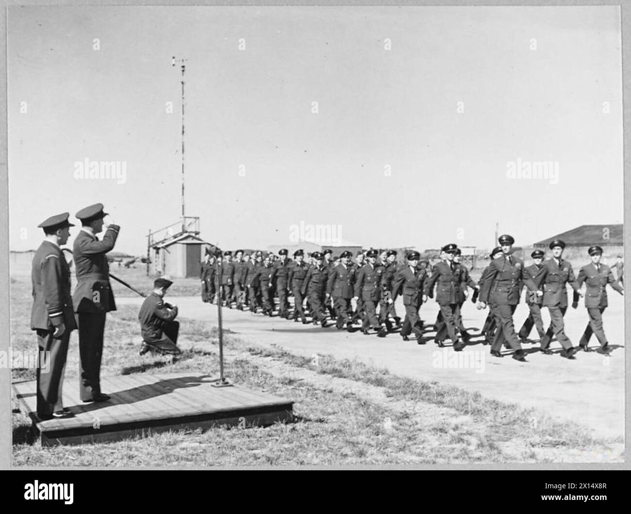 Air Marshal Sir John Slessor and Air Marshal K. Janousek review a ...