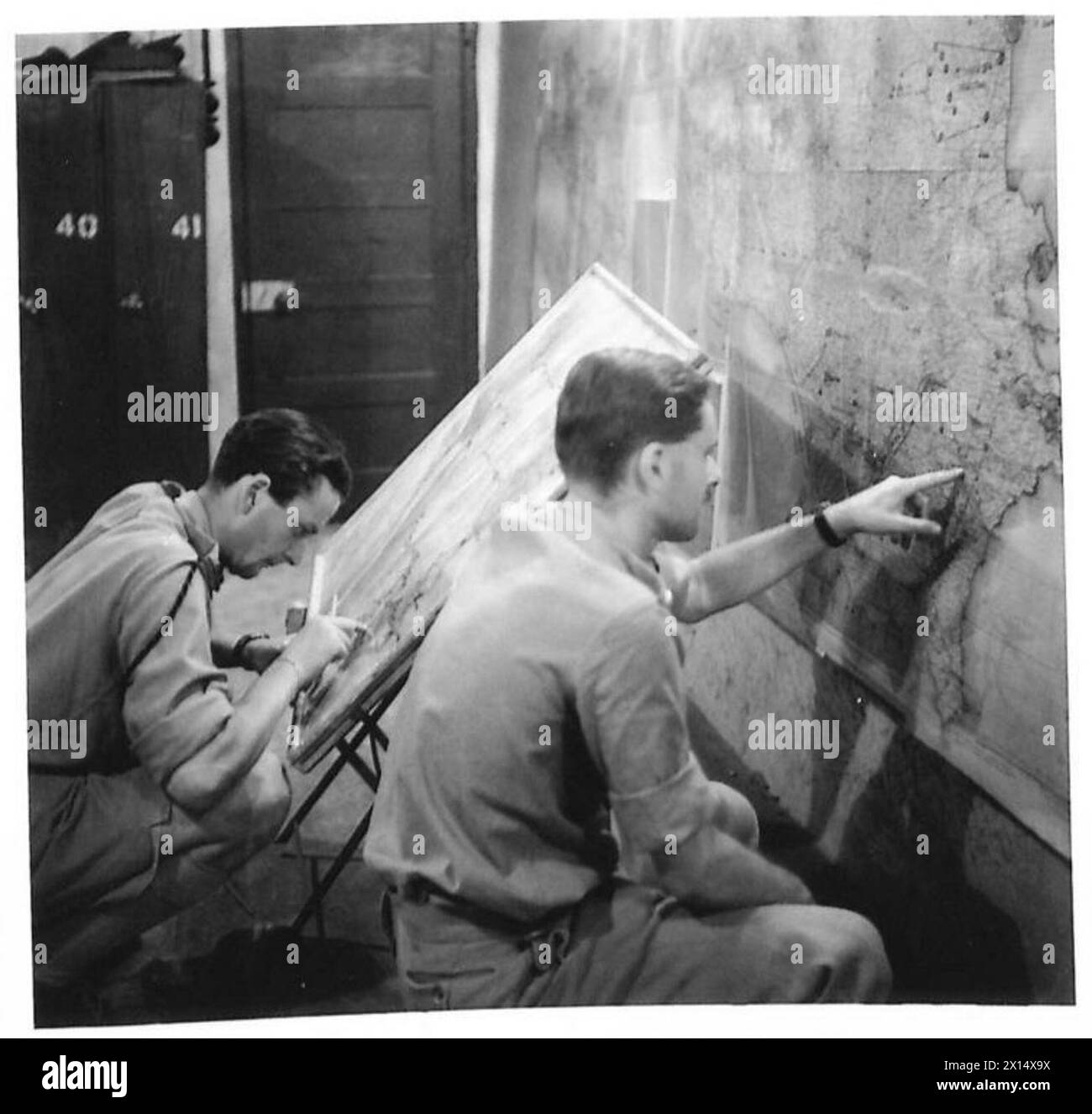 OPERATIONS ROOM MALTA - At work on maps British Army Stock Photo - Alamy