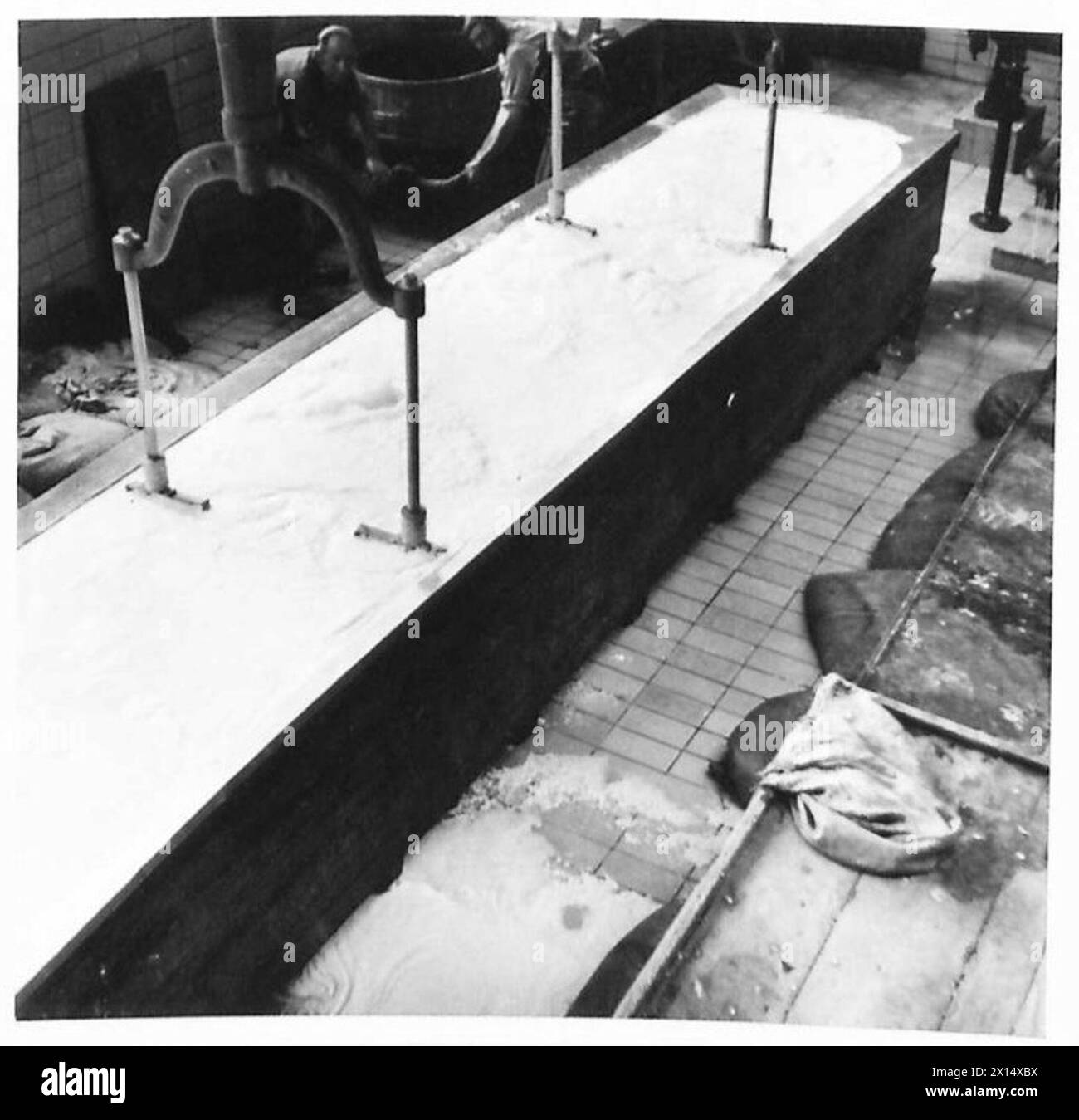 RESTORATION OF FOOD PRODUCTION IN A RHINE AREA IN GERMANY - A large vat ...