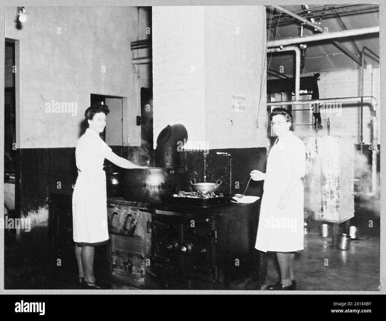 Mother and daughter serve as WAAF cooks at an RAF Coastal Command ...