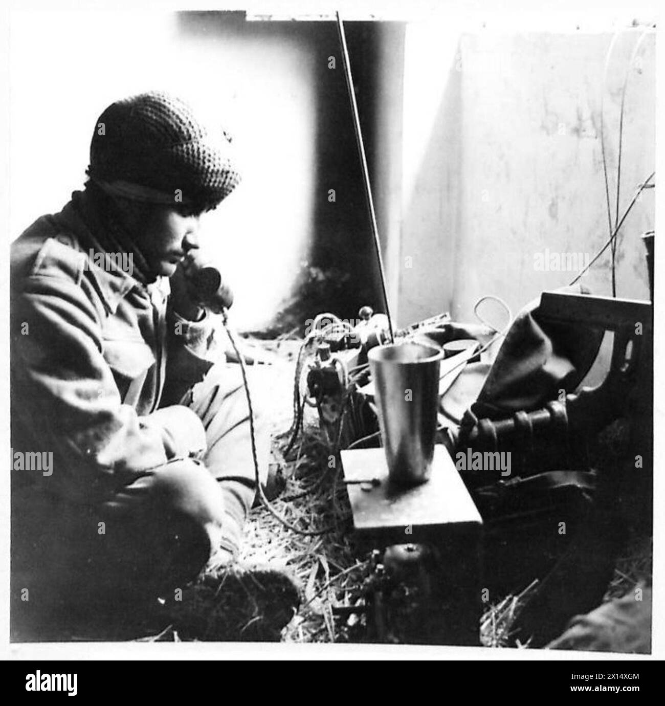 Indian and British signalmen collaborate in a forward observation post ...