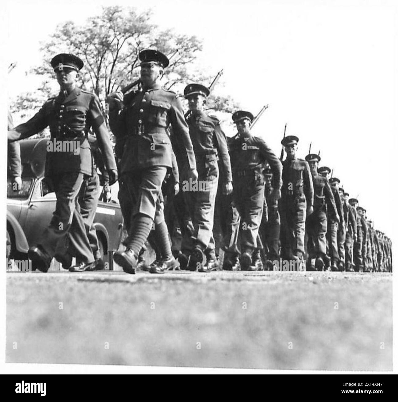A training battalion of the Welsh Guards marches as part of British ...